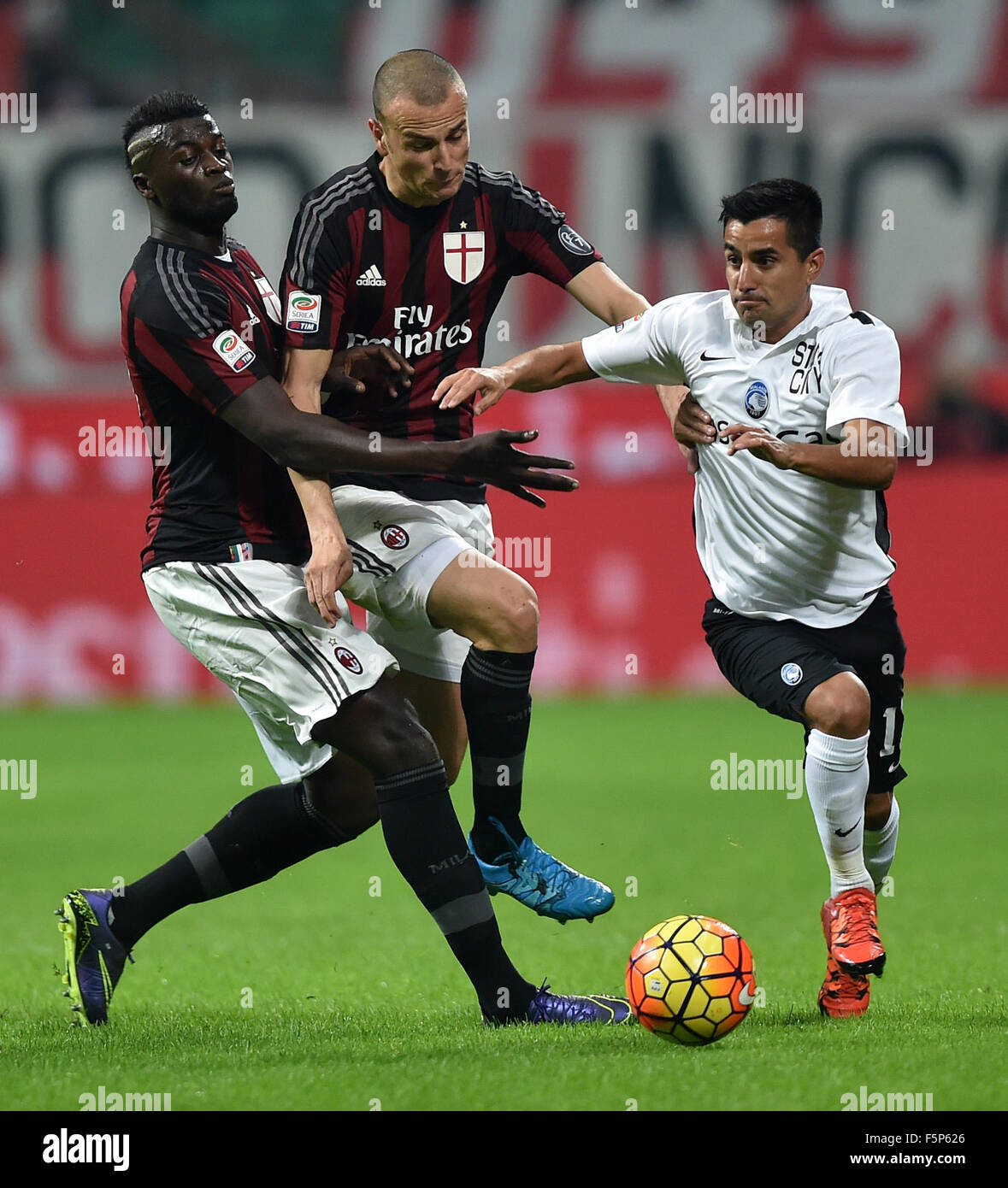 Milano, Italy. 7th Nov, 2015. M'baye Niang (L), Luca Antonelli (C) of ...