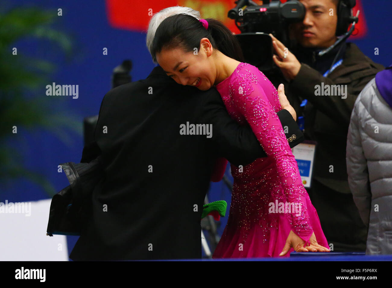 Beijing, China. 6th Nov, 2015. (L-R) Nobuo Sato, Mao Asada (JPN) Figure ...