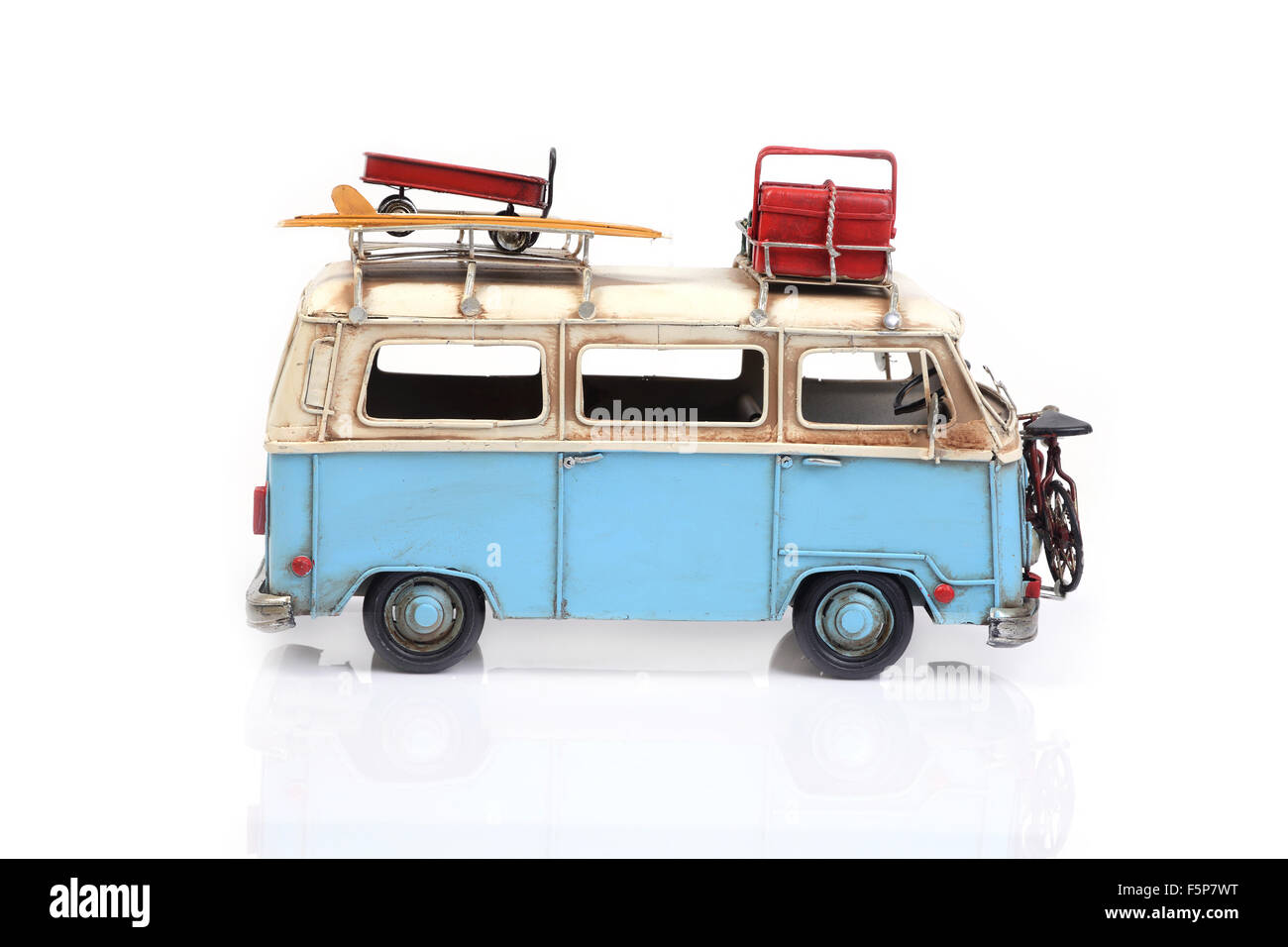 Blue old van toy carried holidays accessory for summer at the beach on ...