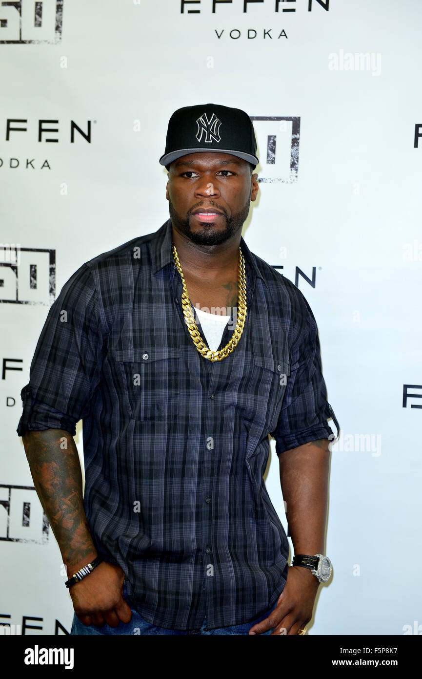 Curtis “50 Cent” Jackson signs an Effen Vodka bottle at Crown Wine ...