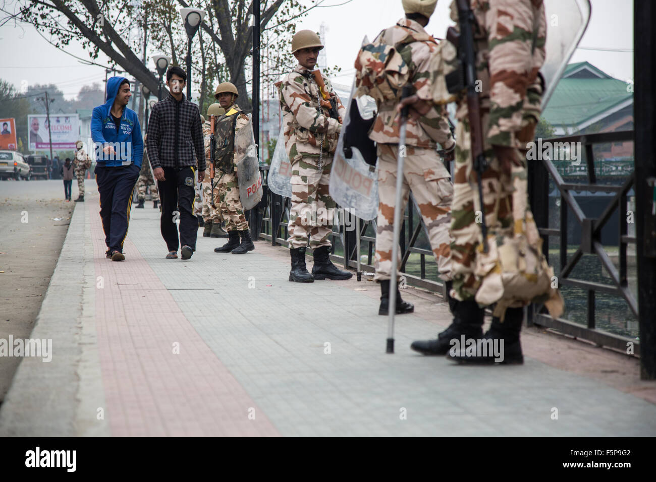 Indian government forces guard the roads during the visit of Indian ...