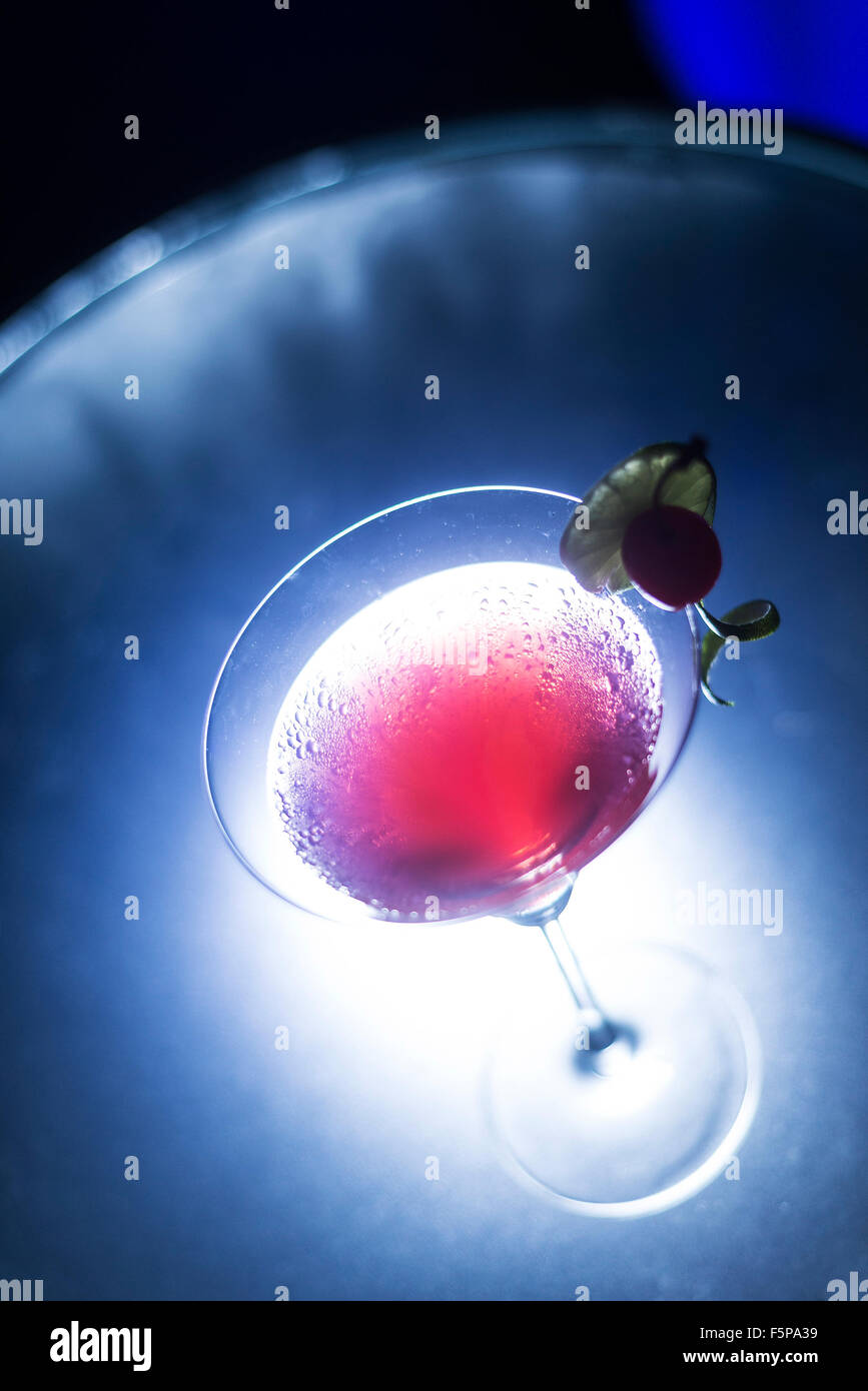 cherry martini trendy cocktail drink at night Stock Photo - Alamy