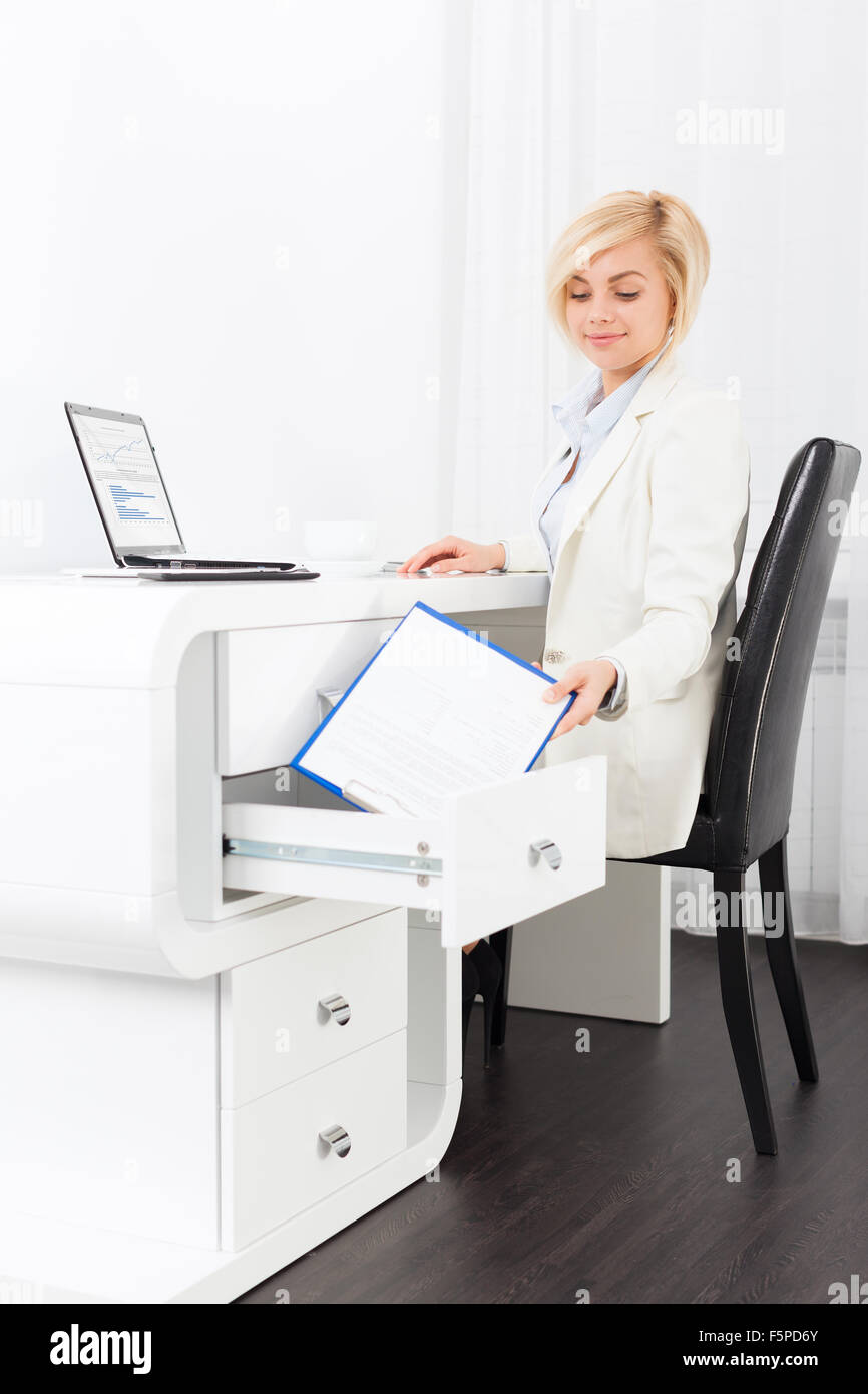 business woman hide document in desk box Stock Photo - Alamy