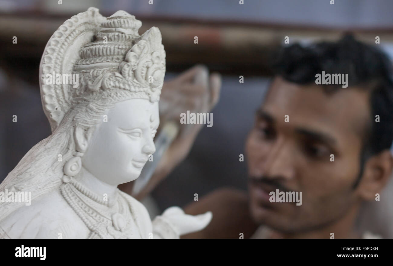 Artist sculpting durga idol Stock Photo - Alamy