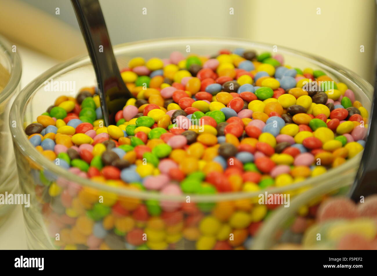 Sweets in bowls, Candy Stock Photo - Alamy