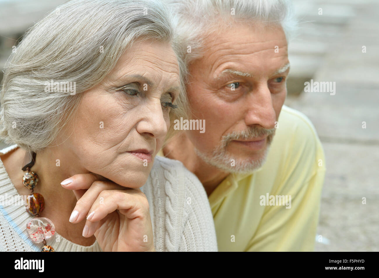 Sad senior couple Stock Photo - Alamy