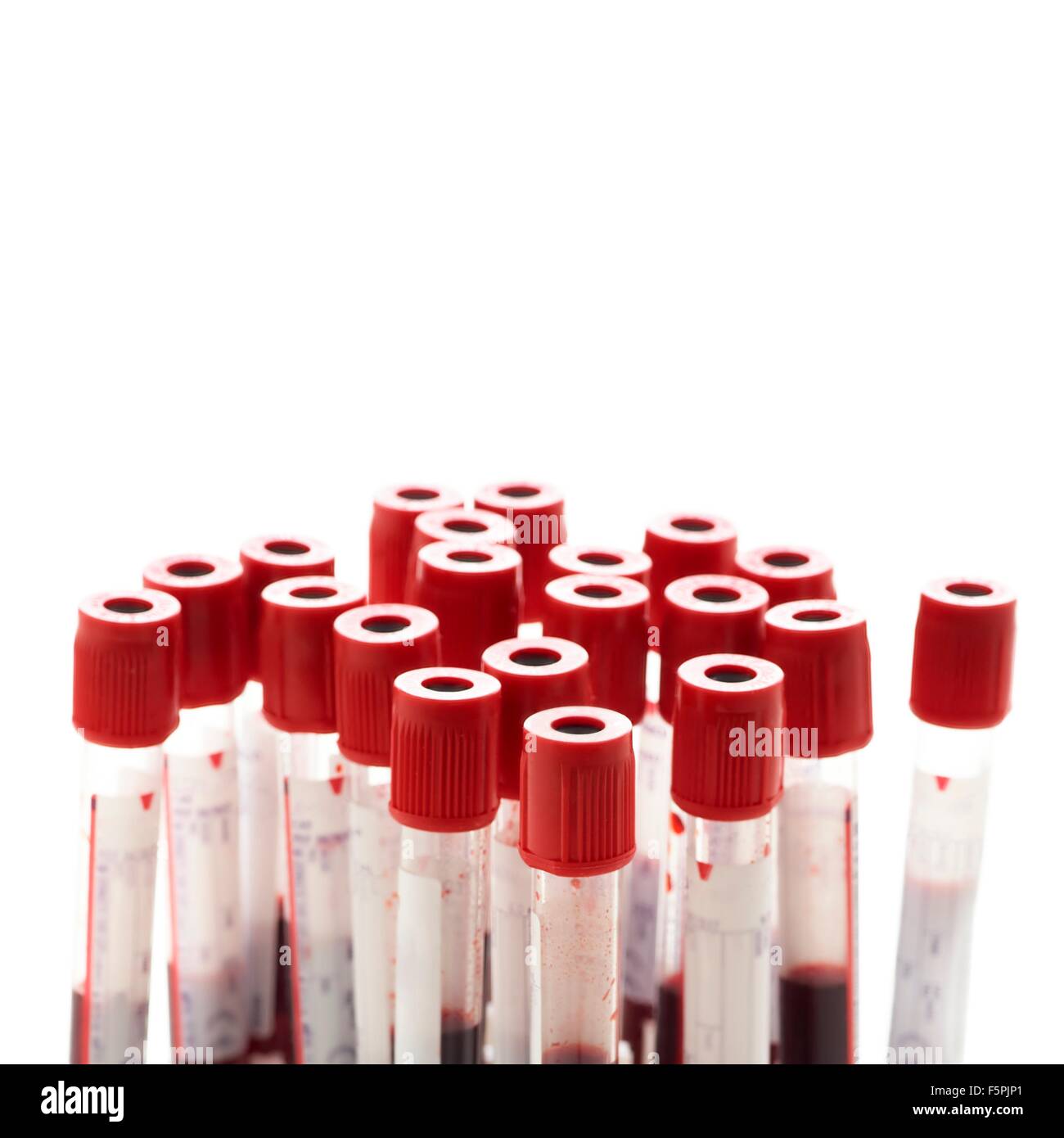 Blood collection tubes against a white background Stock Photo - Alamy