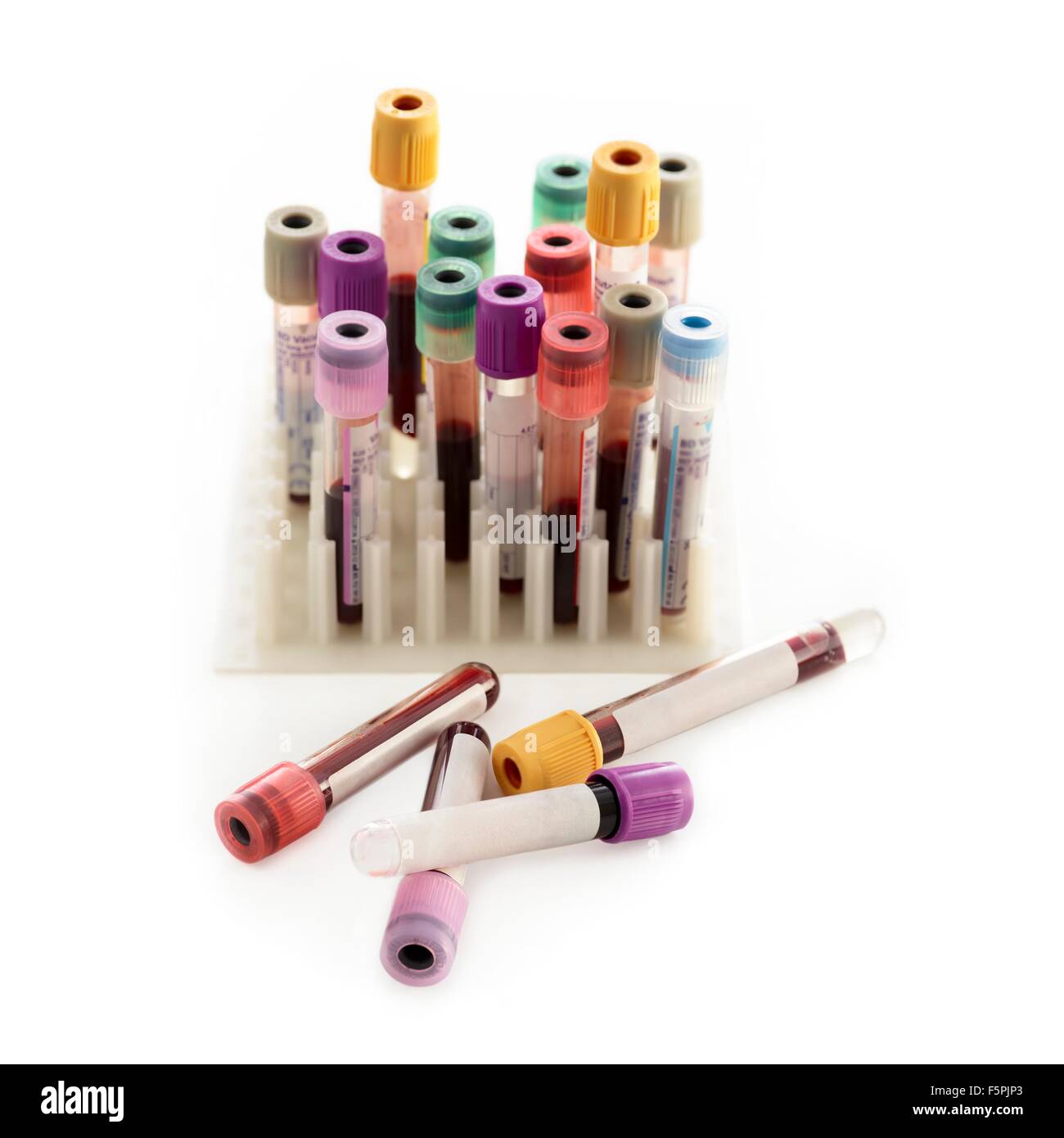 Blood collection tubes against a white background Stock Photo - Alamy