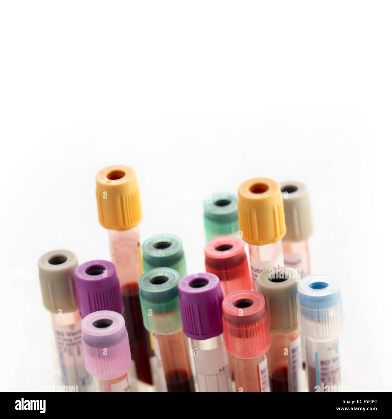 Blood collection tubes against a white background Stock Photo - Alamy
