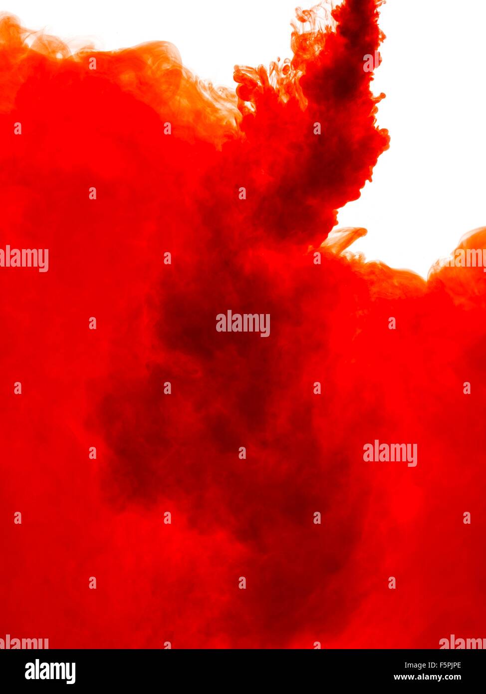 Red liquid against a white background Stock Photo - Alamy