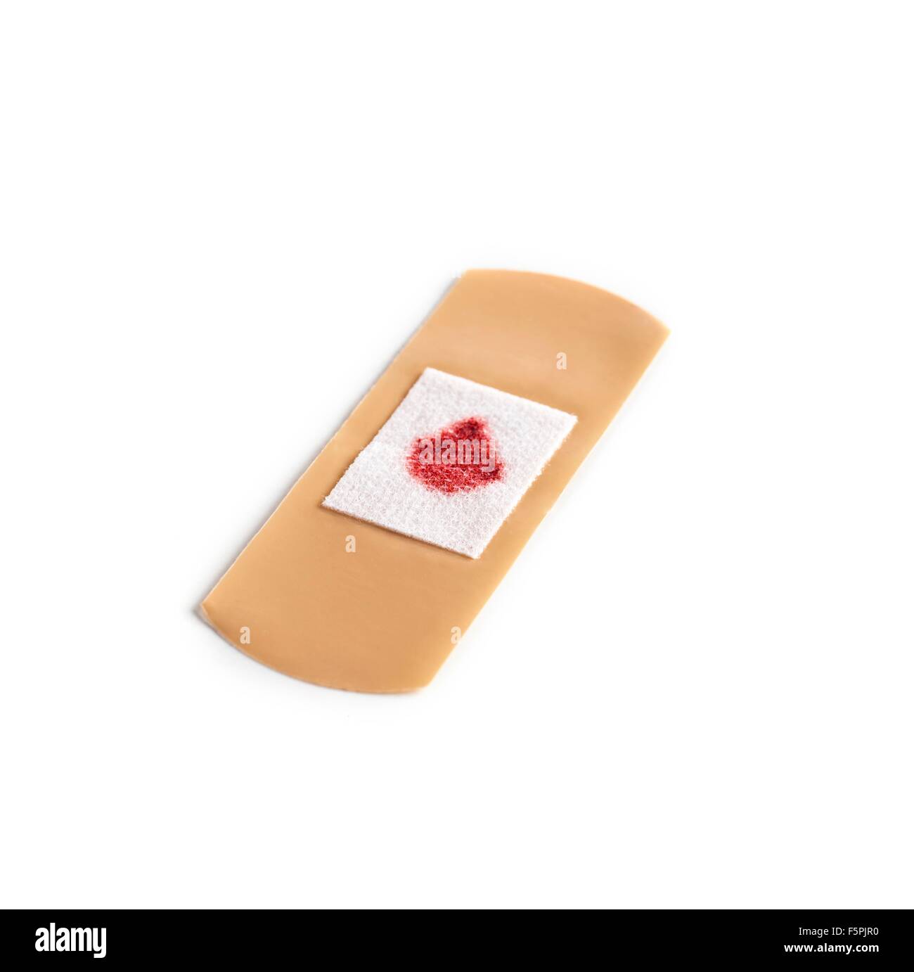 Adhesive plaster with a drop of blood, studio shot Stock Photo - Alamy