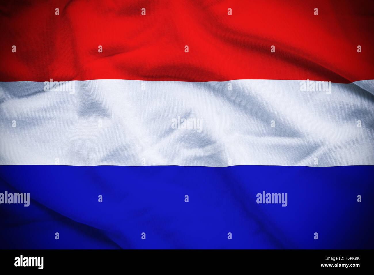 Wavy and rippled national flag of Netherlands background Stock Photo ...