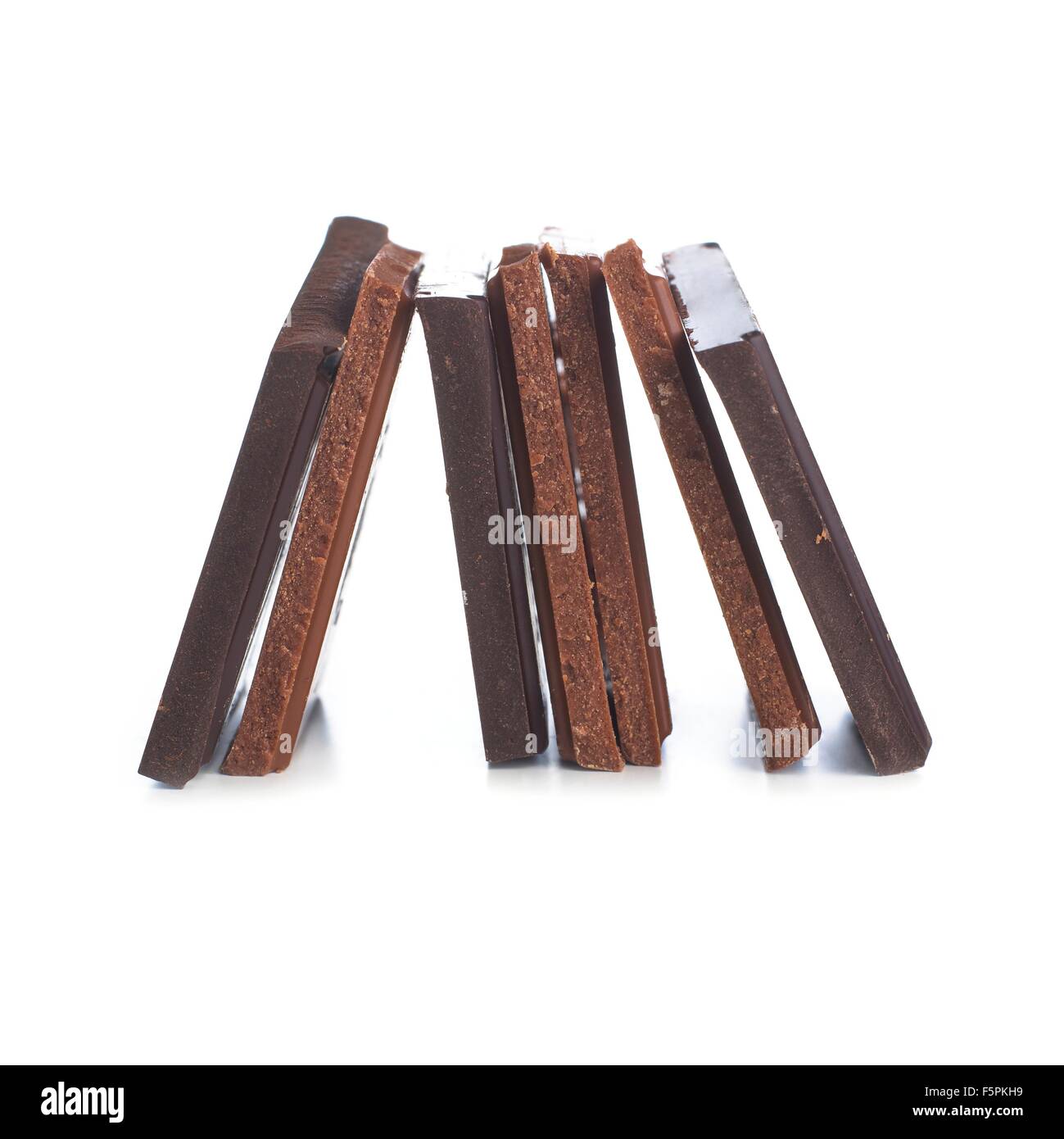 Milk and dark chocolate against a white background Stock Photo - Alamy