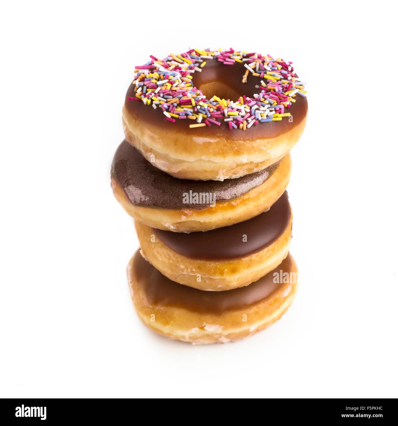 Stack of doughnuts against a white background Stock Photo - Alamy