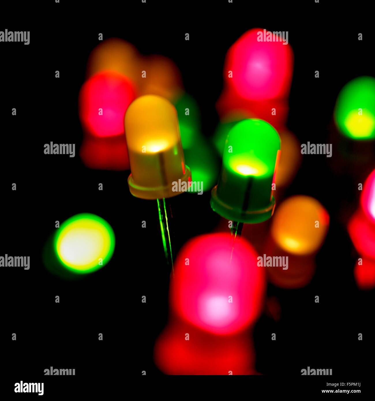 Coloured light emitting diodes (LEDs) against a black background Stock ...