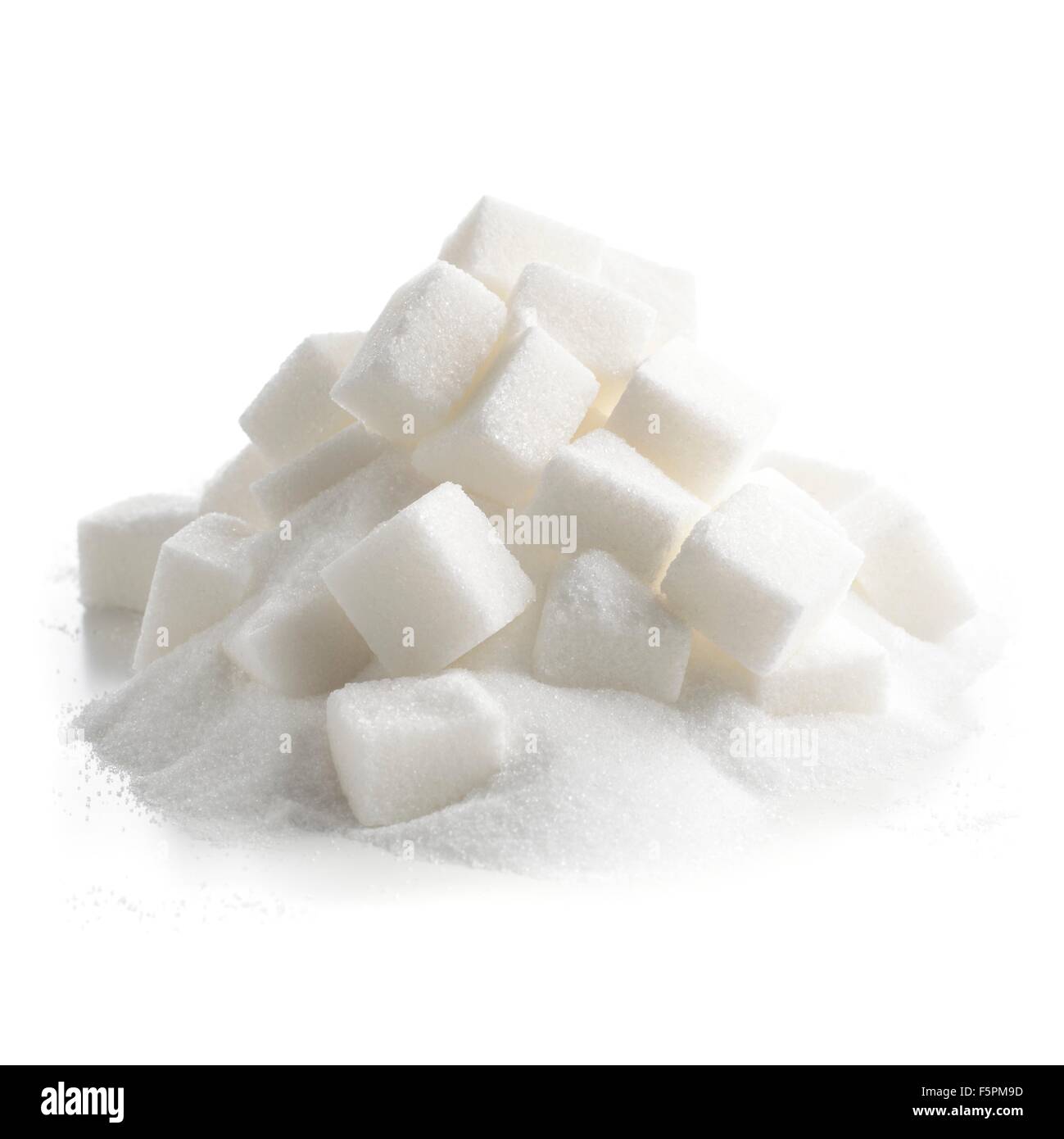 Sugar lumps against a white background Stock Photo - Alamy