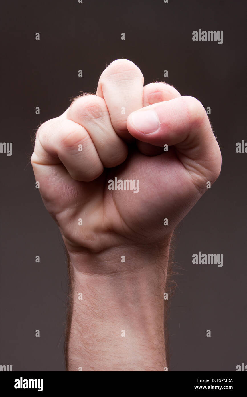 Close-up of man fist - symbol of power Stock Photo - Alamy