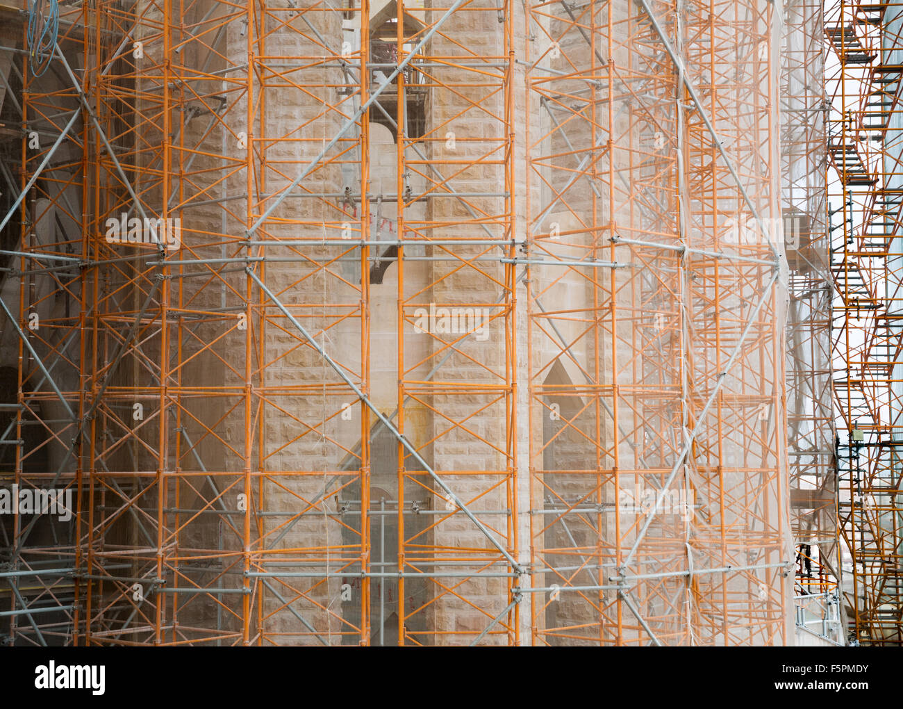 Construction site - scaffolding around new building Stock Photo - Alamy