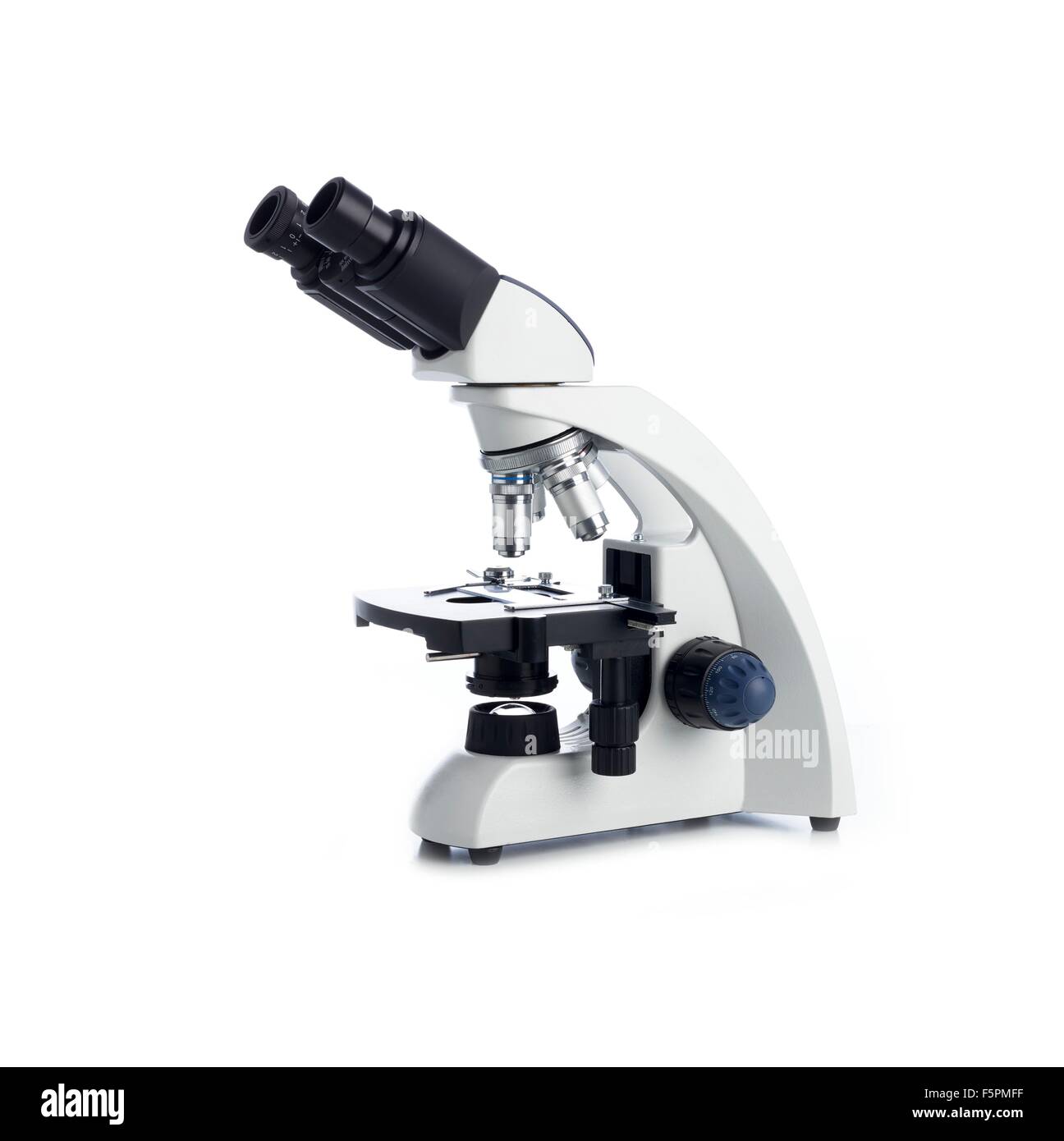 Light microscope against a white background Stock Photo - Alamy