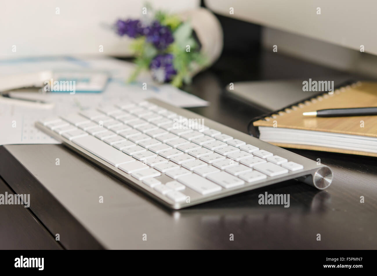 Office desk table with keyboard Stock Photo - Alamy