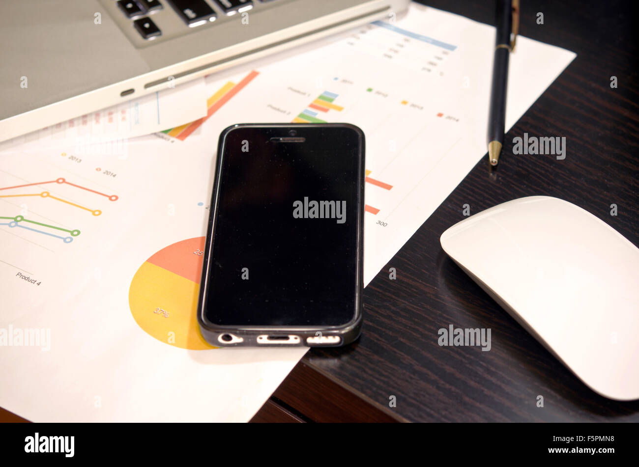 smart phone and computer on desk Stock Photo - Alamy