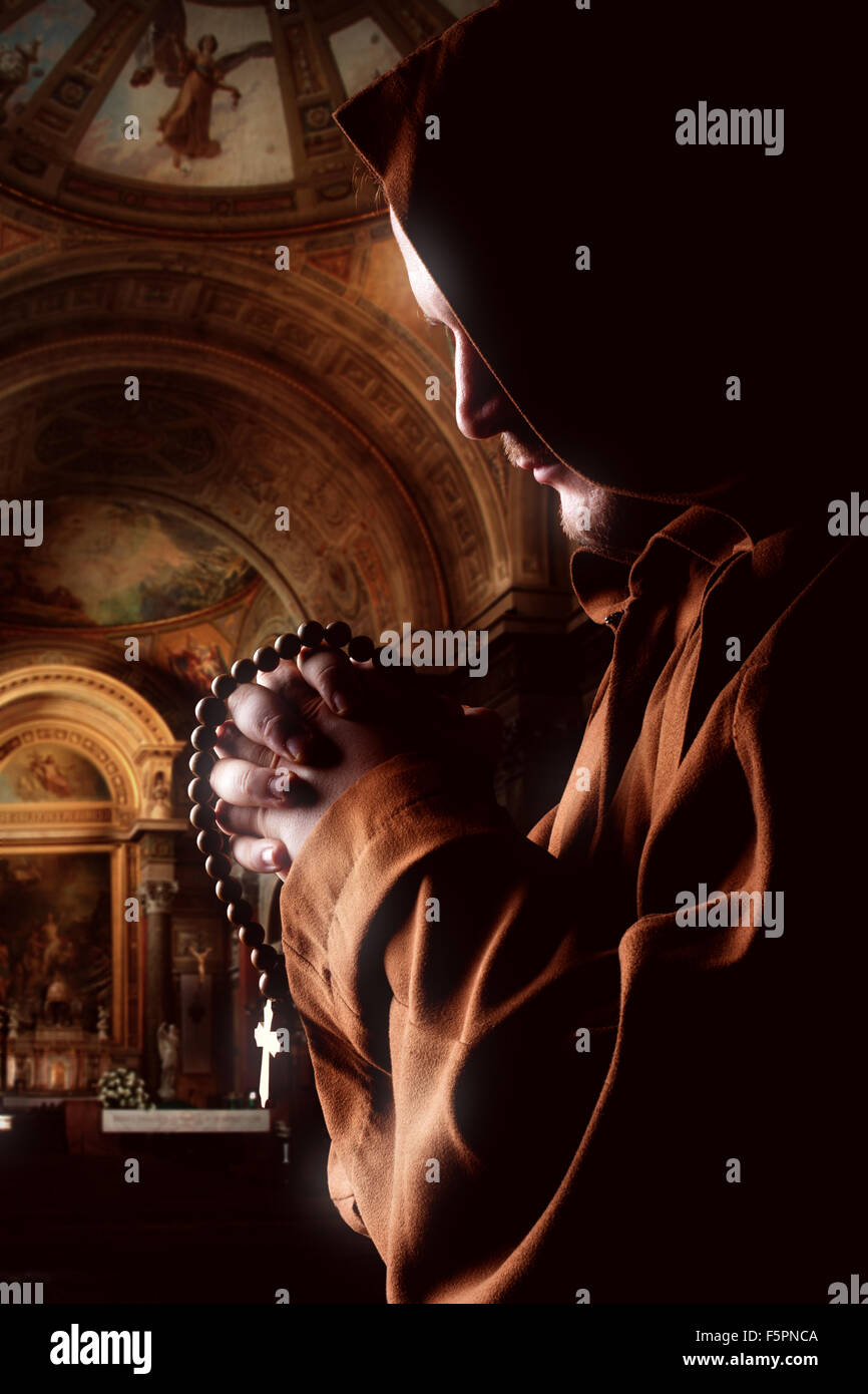 Medieval monk in prayer hi-res stock photography and images - Alamy