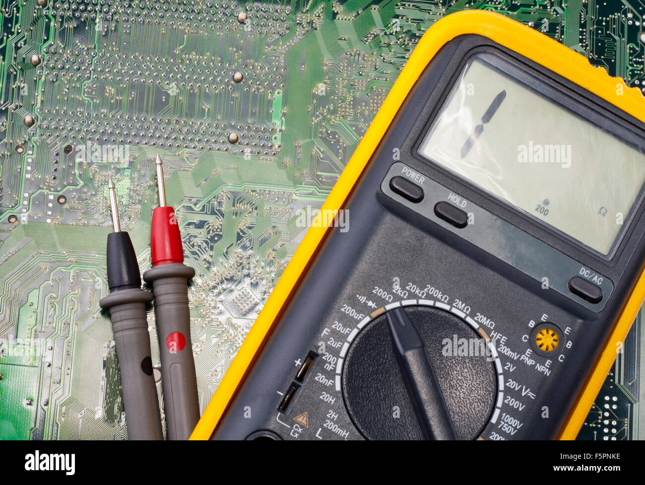 Close-up of digital multimeter on electronics circuit Stock Photo - Alamy