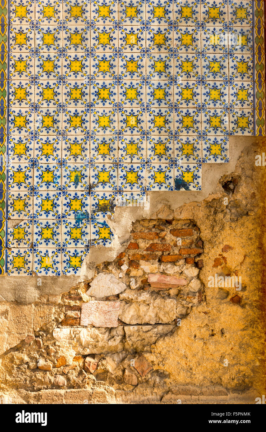 Old wall with tile peeling off Stock Photo - Alamy