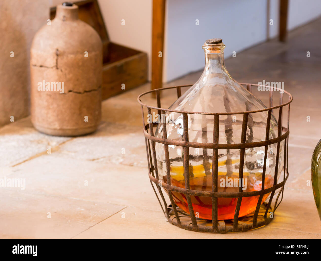 Carboy with some beverage stands on the floor in the kitchen Stock ...