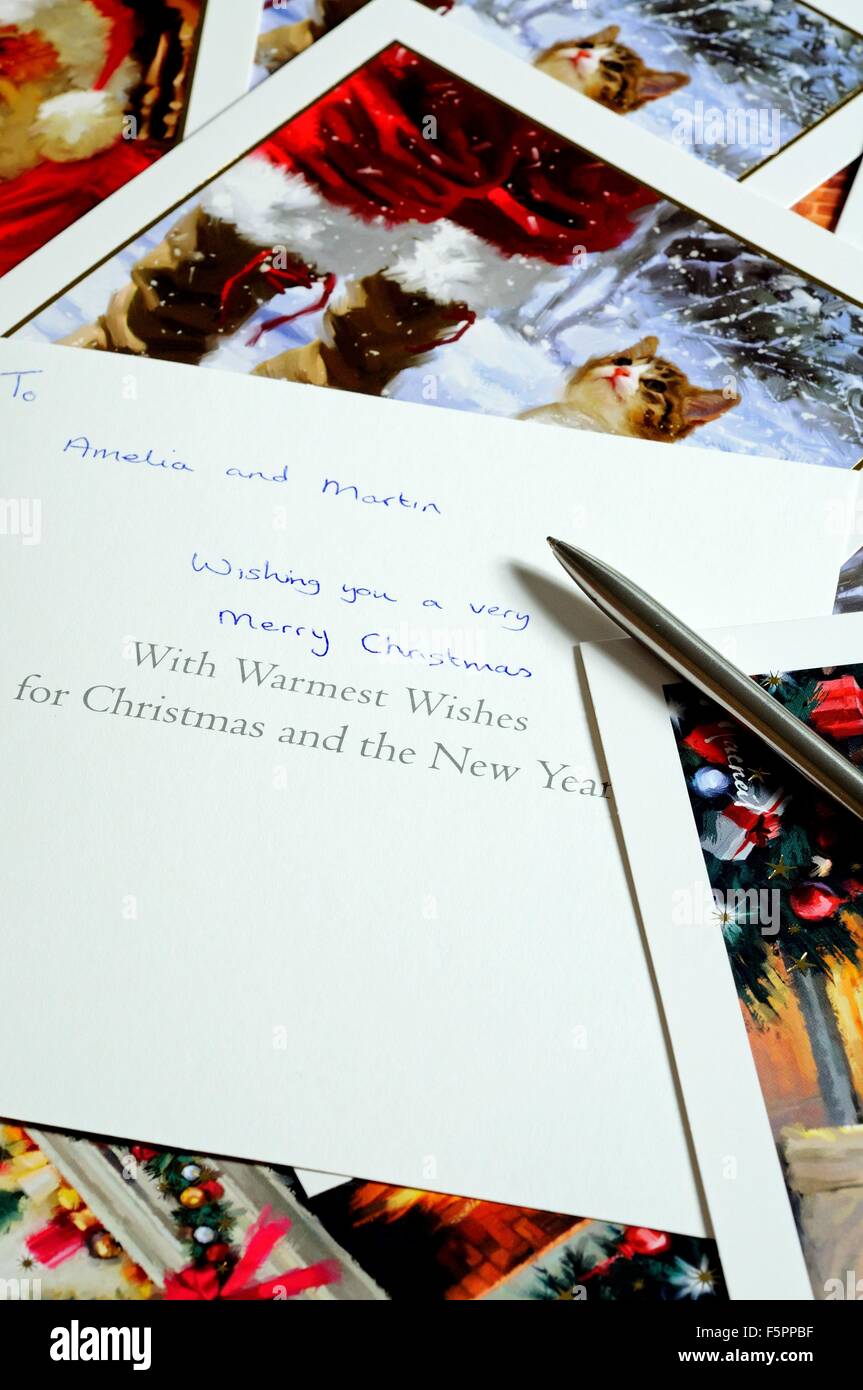 Handwritten Christmas cards with pen Stock Photo - Alamy