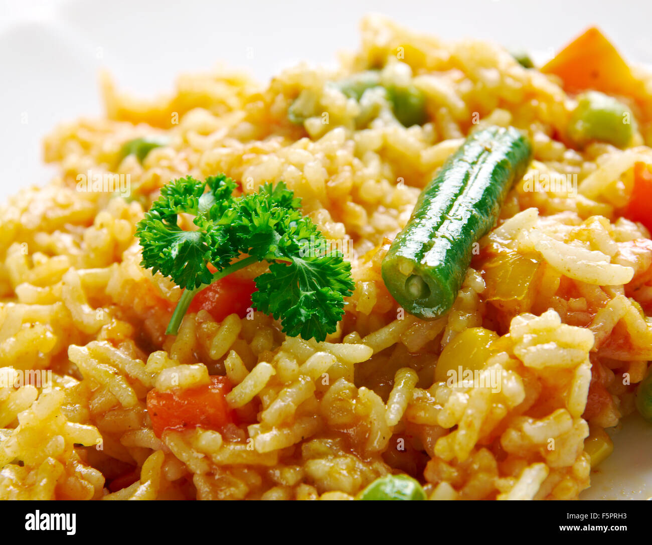 Shahi pulao .Moghlai version of delicately spiced rice Stock Photo - Alamy