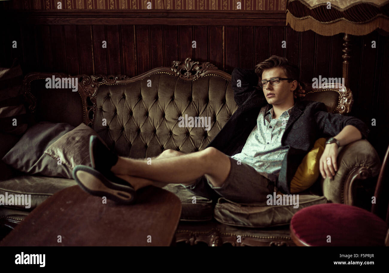 Fashion style photo of a young elegant guy Stock Photo - Alamy