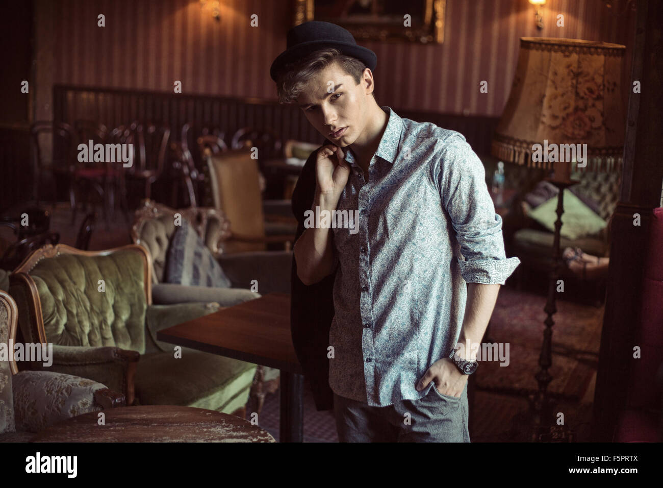 Portrait of a young elegant guy Stock Photo - Alamy