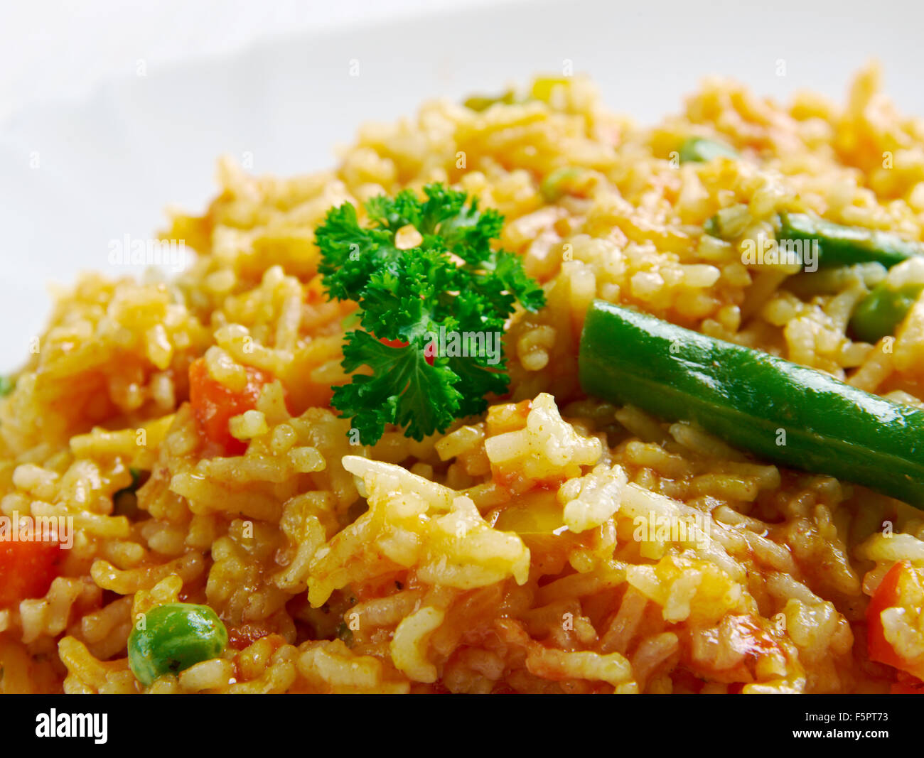 Shahi pulao .Moghlai version of delicately spiced rice Stock Photo - Alamy