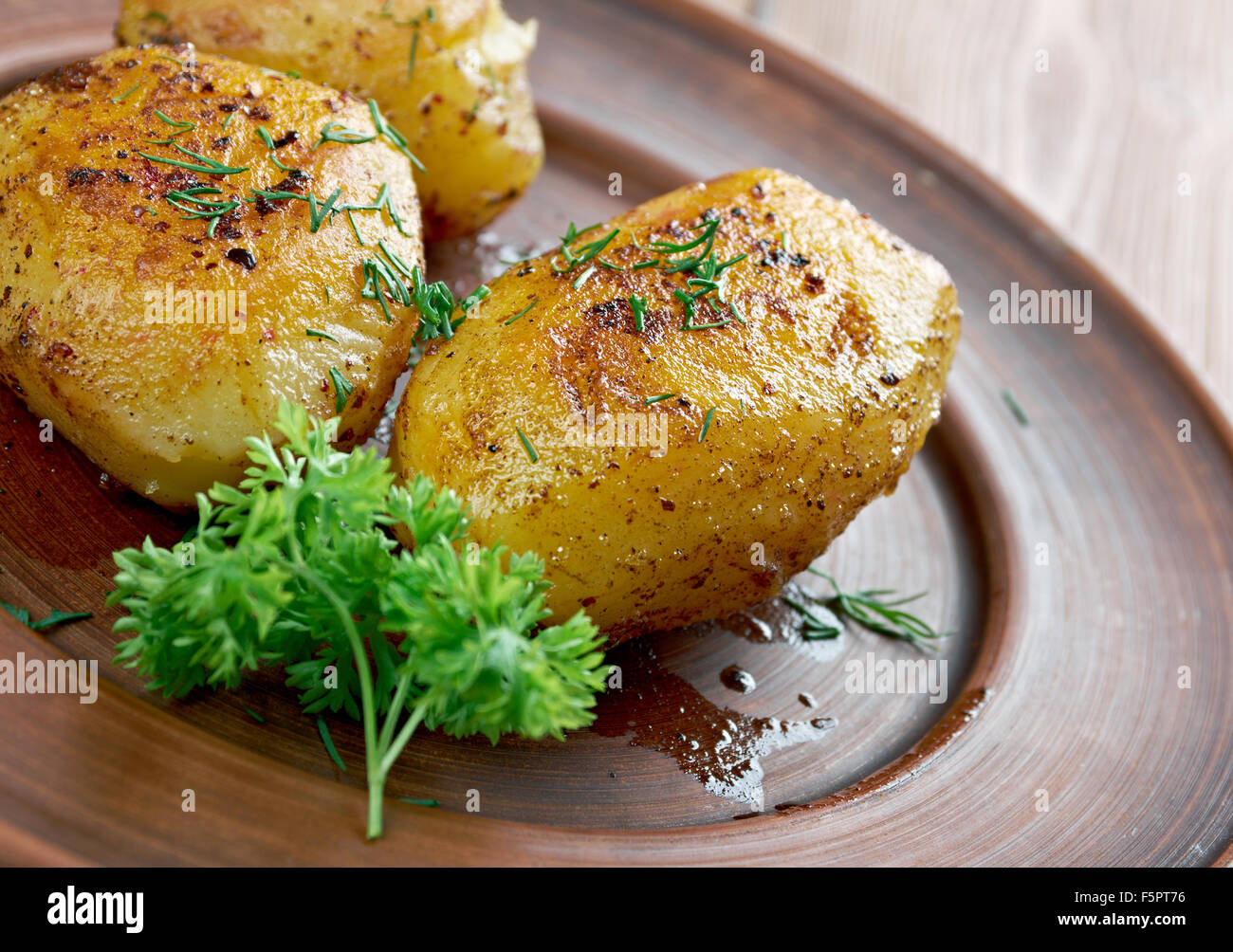 Imthawoma - Libyan potatoes in tomato sauce and spices Stock Photo - Alamy