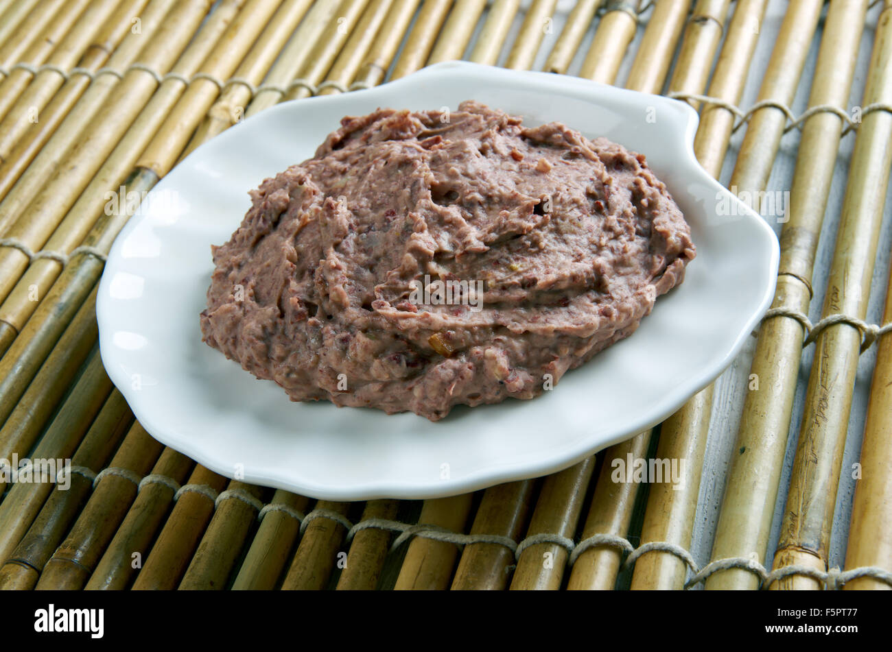 Fisindjan of beans.Azerbaijan cuisine.Mash boiled beans Stock Photo - Alamy