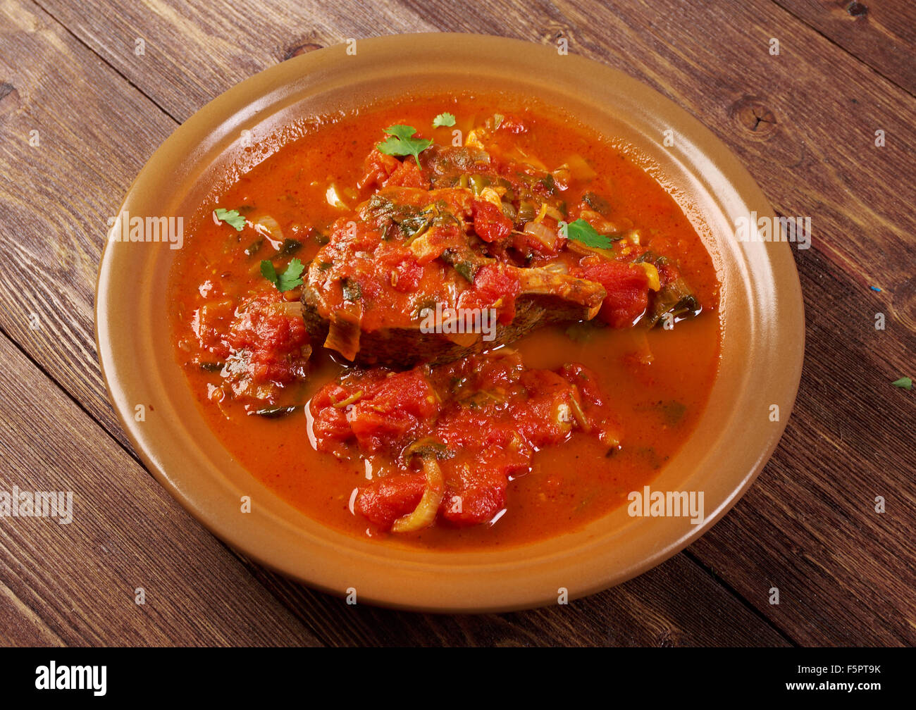 Hraime - Libyan prepared fish . fried mullet in tomato sauce with spice ...