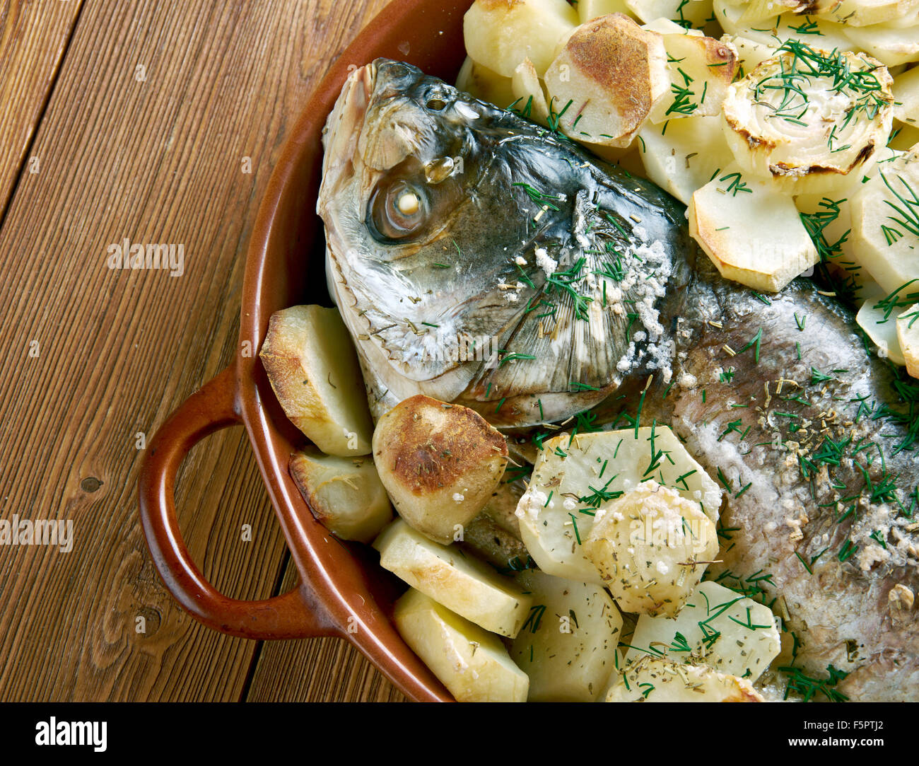 Psari sto fourno.baked fish. Cypriot cuisine Stock Photo - Alamy