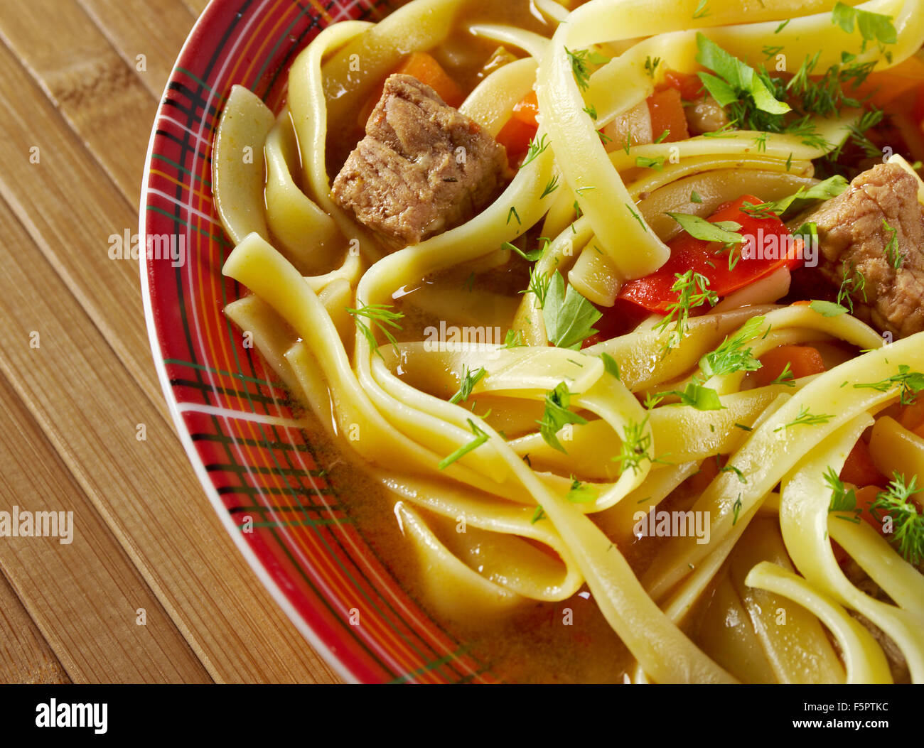 oriental uzbek soup lagman .farm-style Stock Photo - Alamy