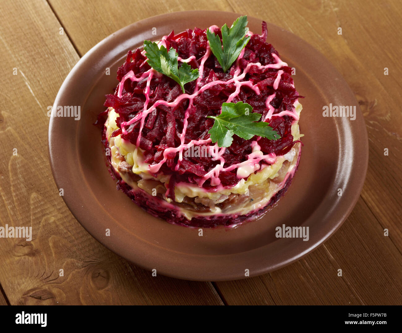 traditional russian salad with salted herring and beet -Selyodka Pod ...