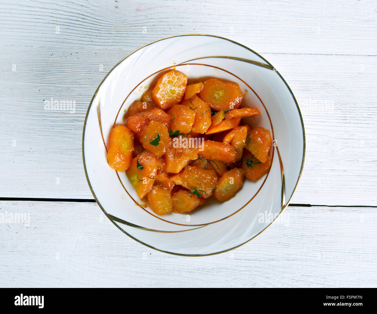 Carrots Vichy - Stewed carrots with cream and parsley Stock Photo - Alamy