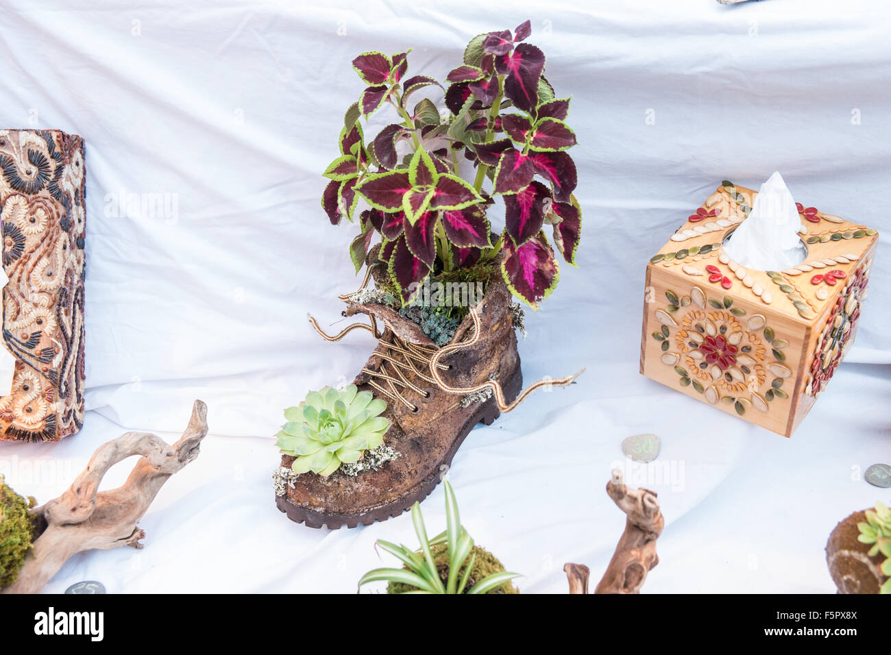 Art work recycled,reused, shoes,boots, for sale at stall at Esperaza ...