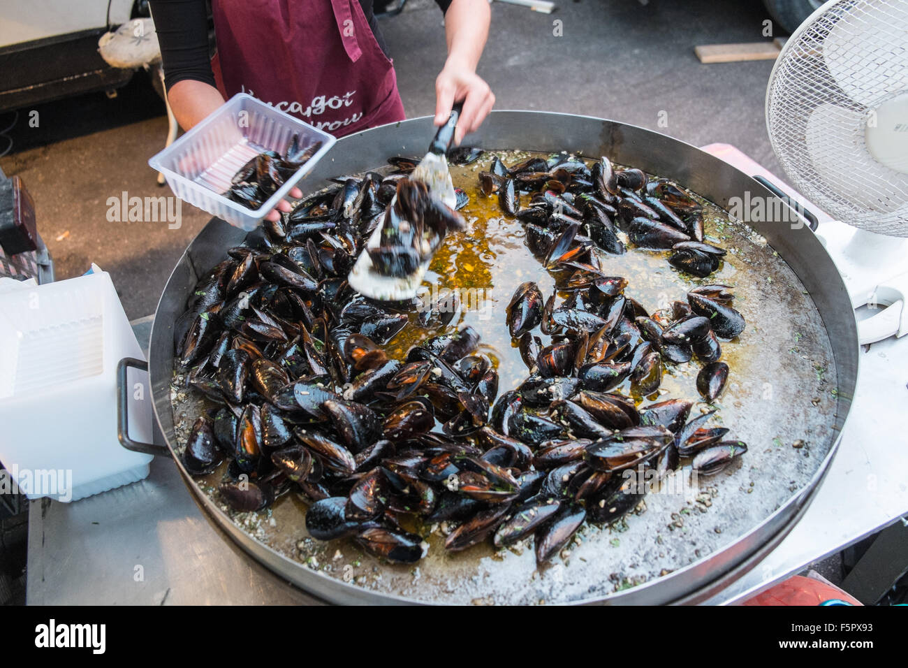 Mussels, being cooked,French delicacy at stall at Esperaza Night Market ...