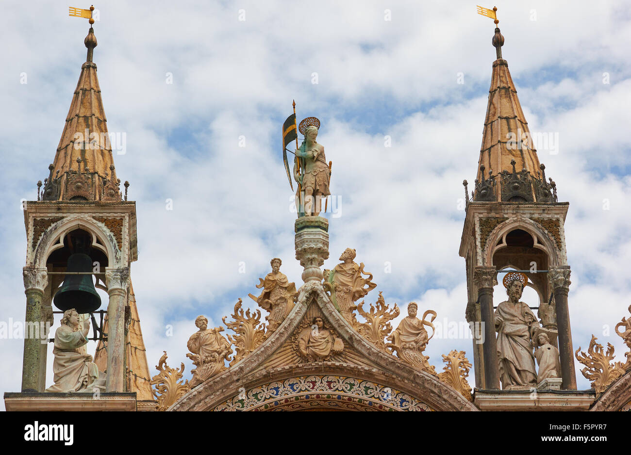 Ornate spires and carved stone parapets Basilica Di San Marco Venice ...