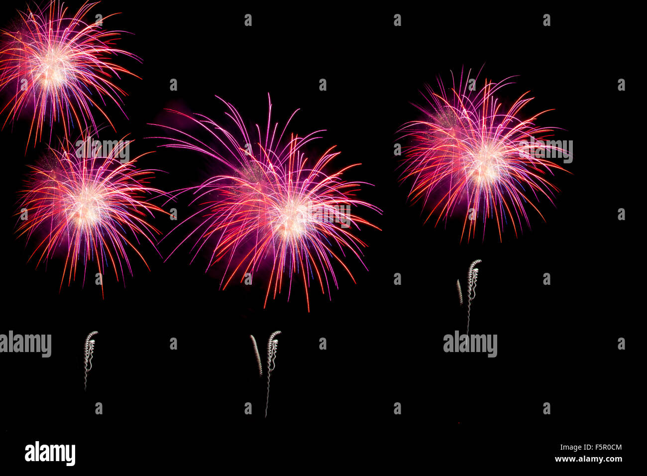 Fireworks over the city celebrate in happy festival Stock Photo - Alamy