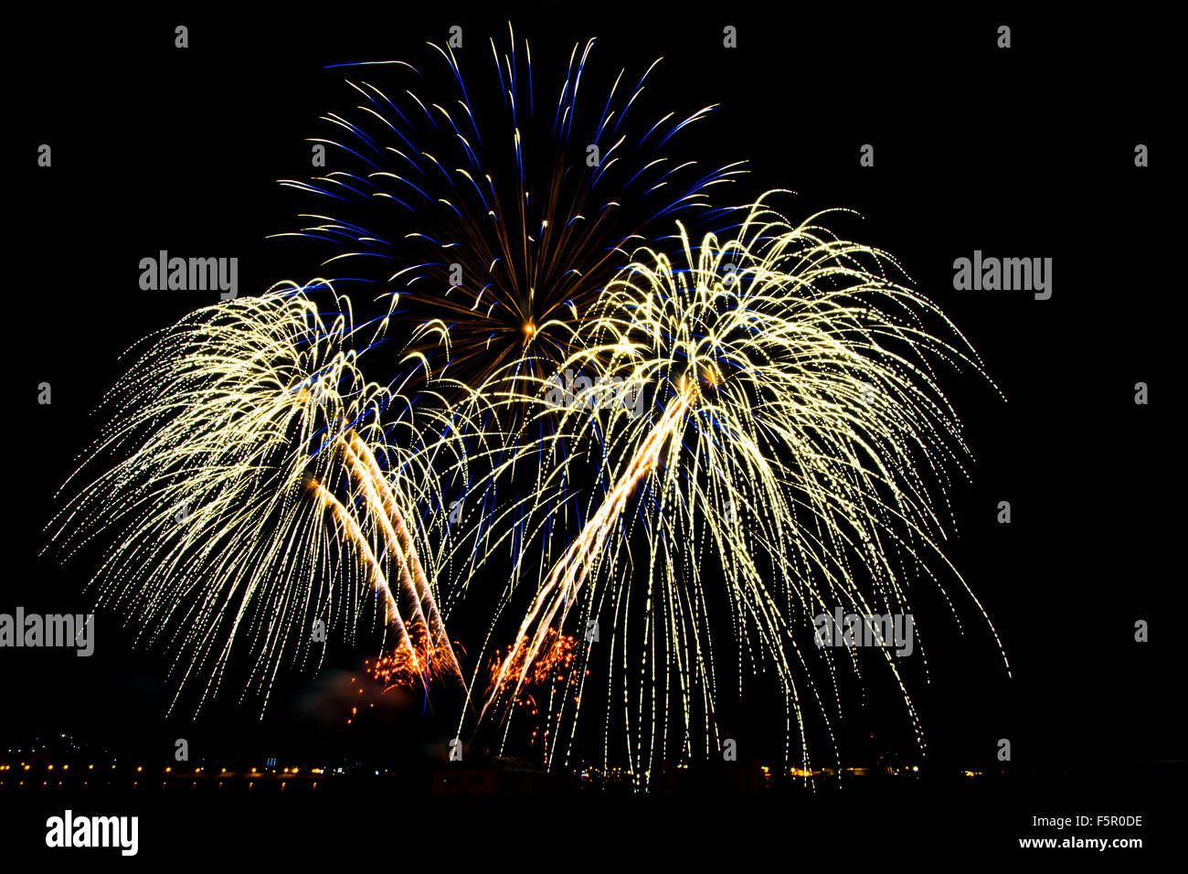 Fireworks over the city celebrate in happy festival Stock Photo - Alamy