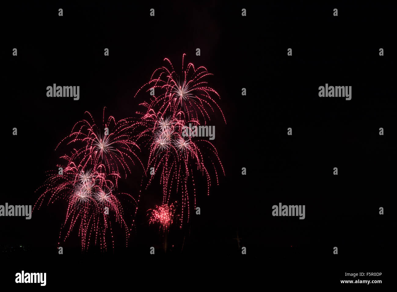 Fireworks over the city celebrate in happy festival Stock Photo - Alamy