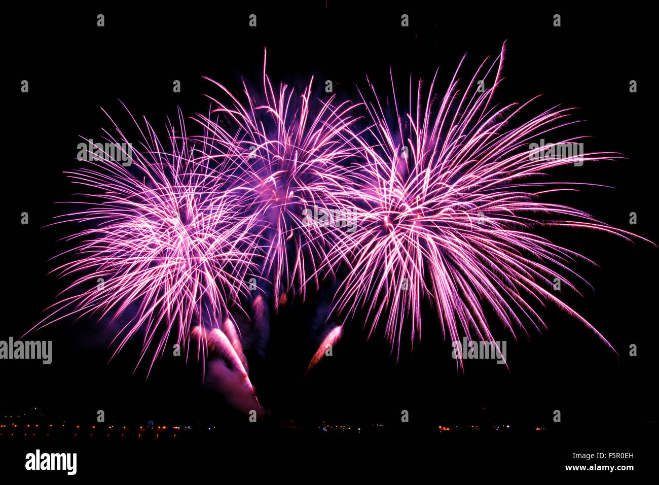 Fireworks over the city celebrate in happy festival Stock Photo - Alamy