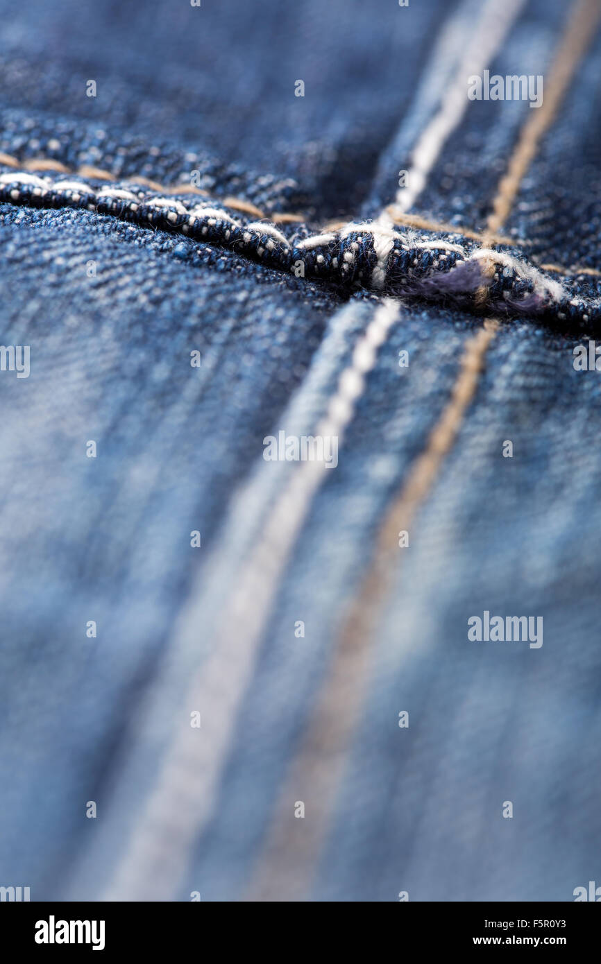 Closeup of seam on blue jeans Stock Photo - Alamy