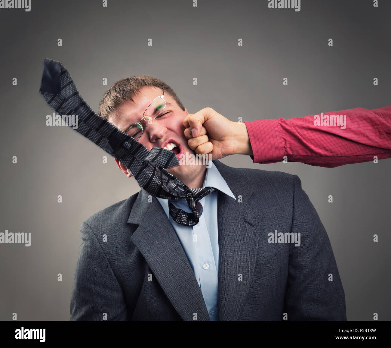 Aggressive office worker put up a fight Stock Photo - Alamy